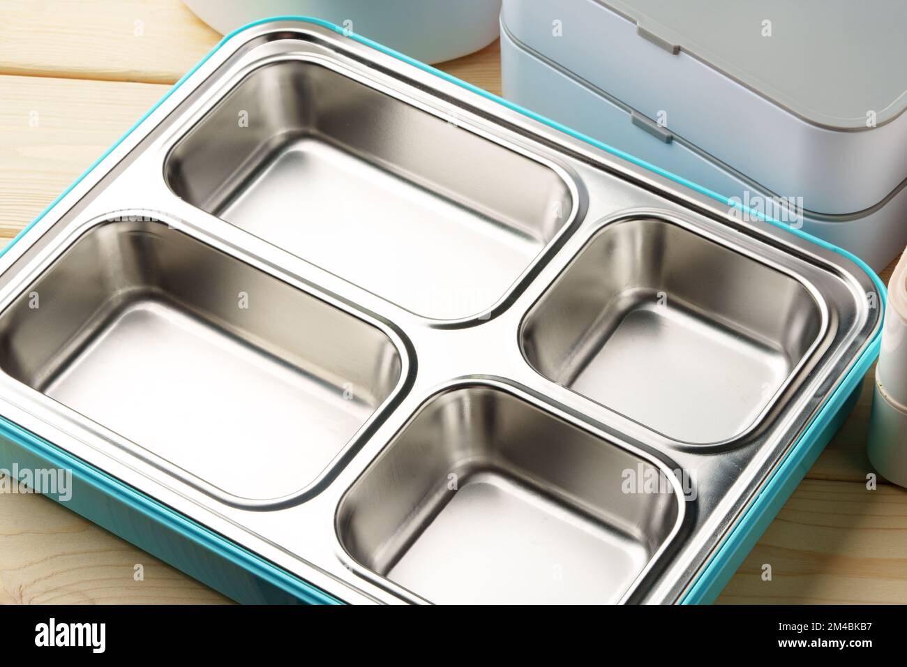 Plastic empty lunch box with metal compartments Stock Photo - Alamy