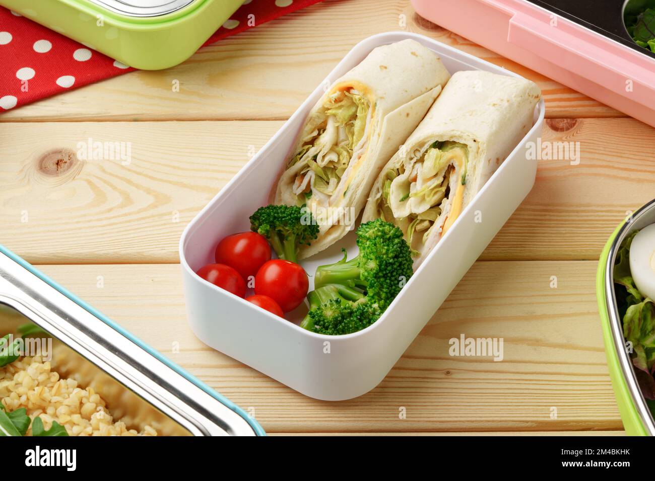 Containers with healthy food on wooden background top view Stock Photo ...