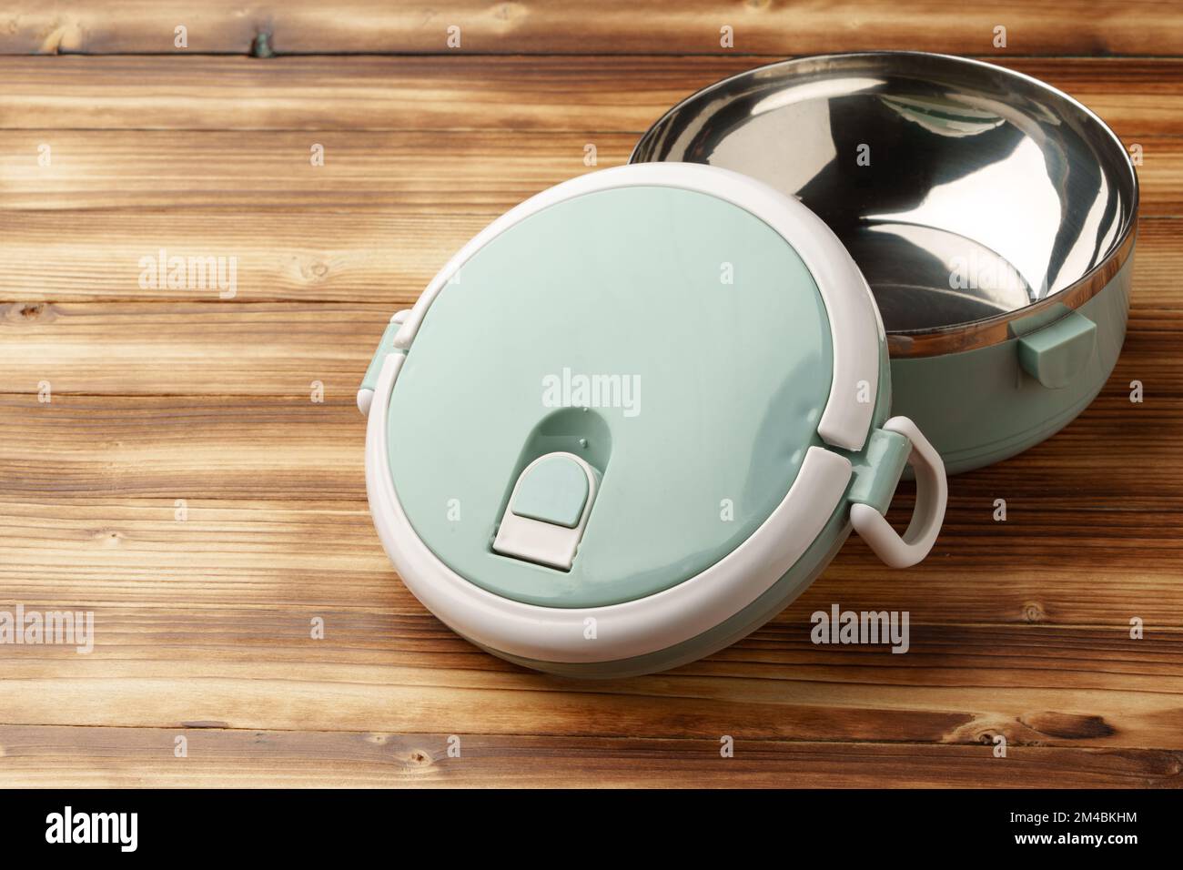 New empty plastic lunch box on a wooden background Stock Photo - Alamy