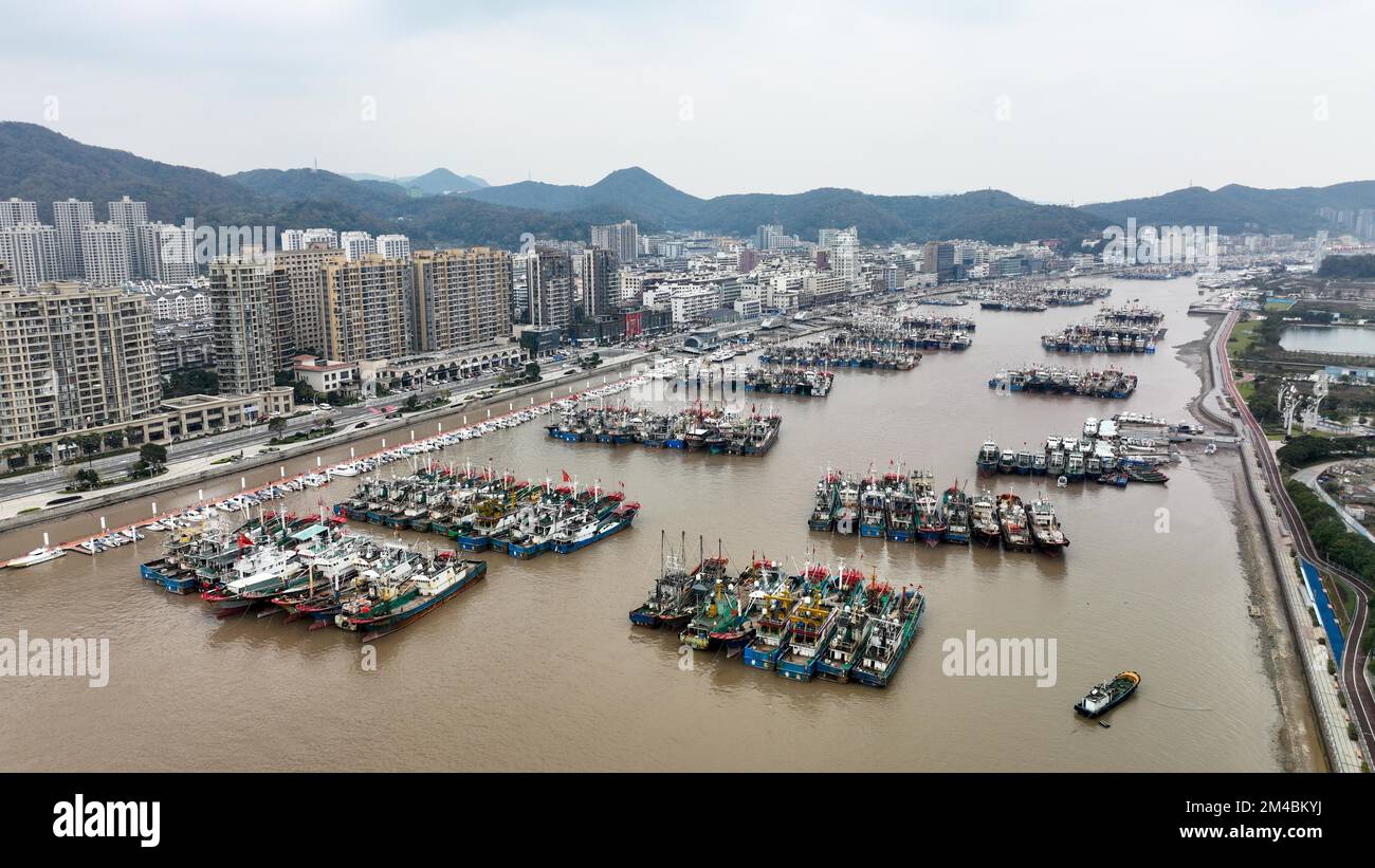 Aerial photo shows fishing boats returning to the harbor to avoid cold ...