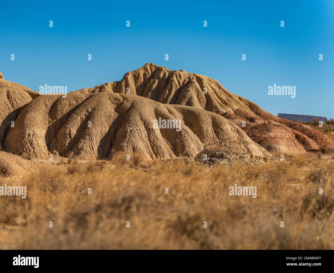 Bardenas iconic desert formations view of the hillside Stock Photo - Alamy