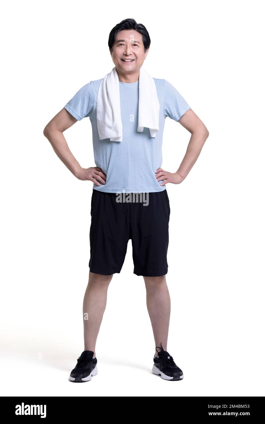 Studio shot of senior Chinese man exercising Stock Photo - Alamy