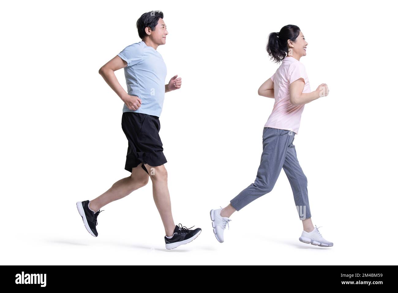 Couple senior running Cut Out Stock Images & Pictures - Alamy