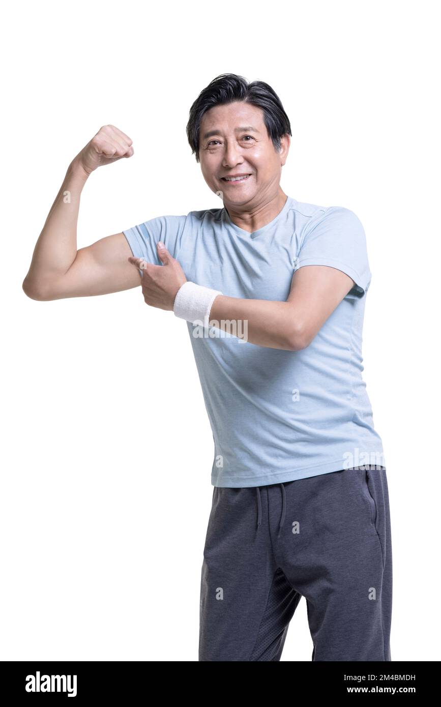 Senior flexing muscles hi-res stock photography and images - Alamy