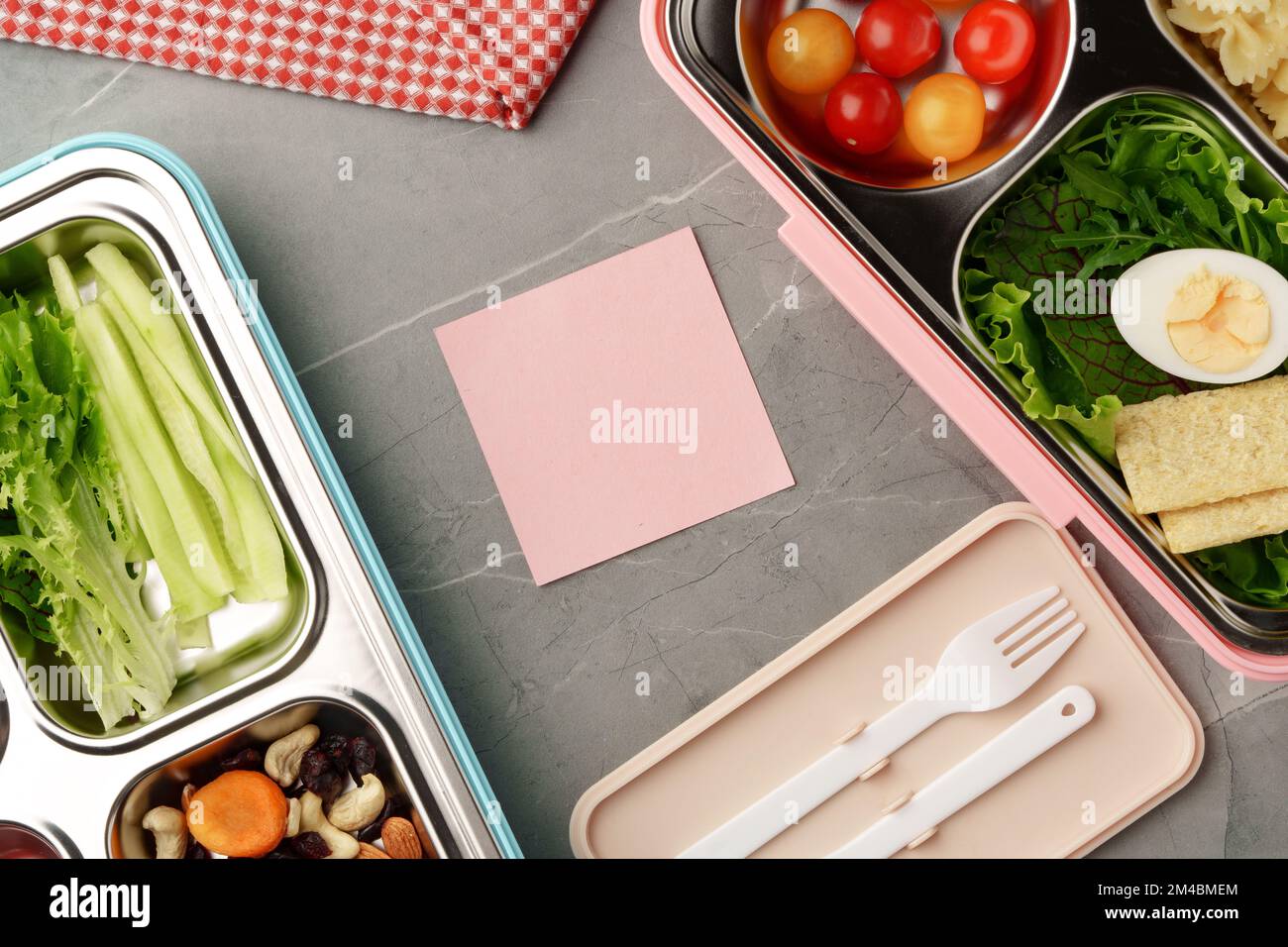 Containers with healthy food on gray background top view Stock Photo ...