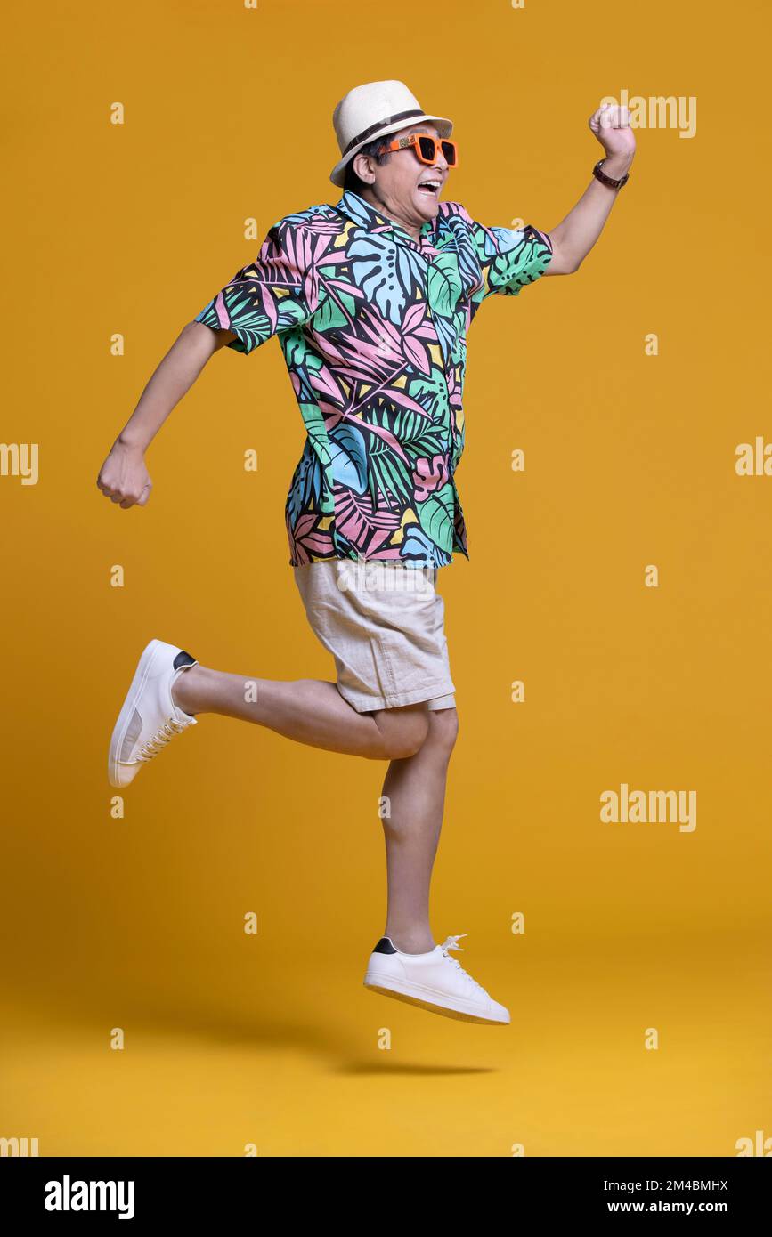 Running mid air senior hi-res stock photography and images - Alamy