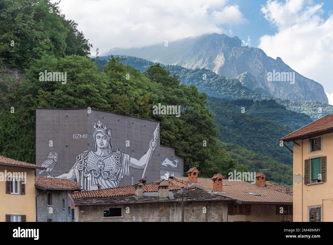 mural of minerva by ozmo in ronchi square, breno, italy Stock Photo - Alamy