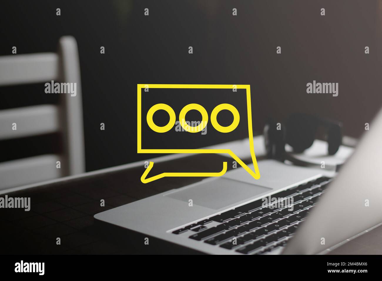 Yellow message icon on minimal workplace background. Chat mail concept ...