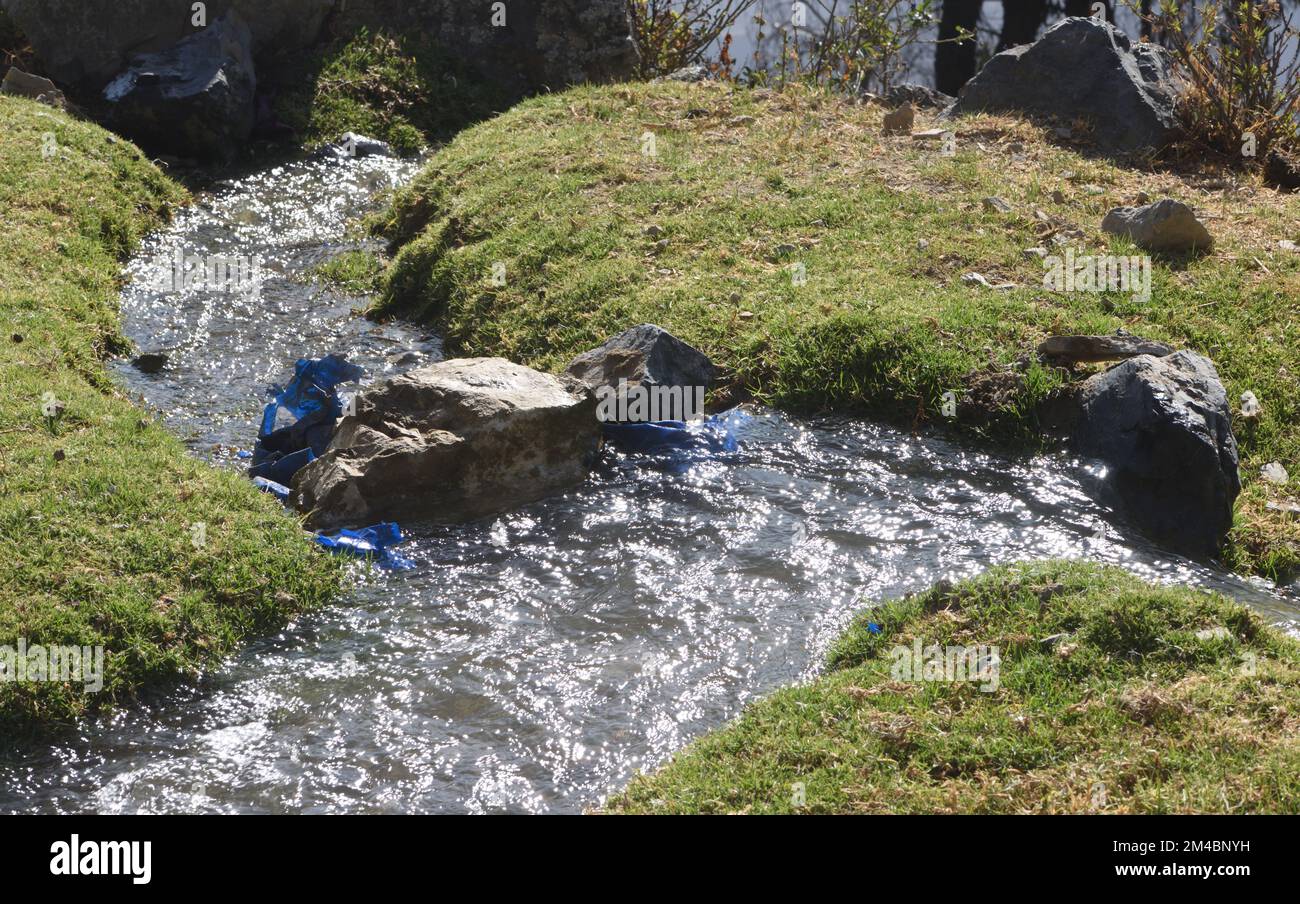 Irrigation channels controlled by strategically placed rocks and ...