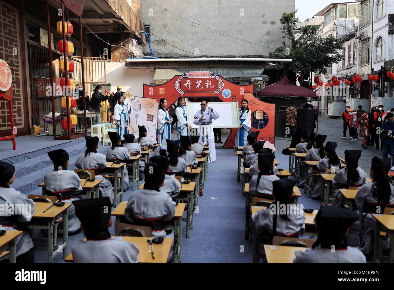Students displayed the traditional "first writing ceremony" at the 13th ...
