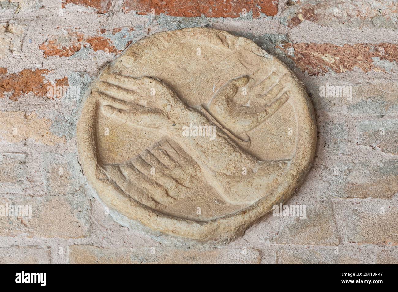 francis symbol, san francesco del deserto, italy Stock Photo - Alamy
