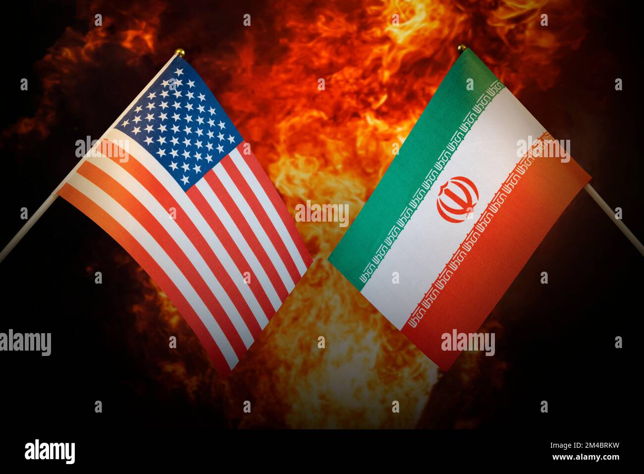 Flags of iran and United States of america against the background of a ...