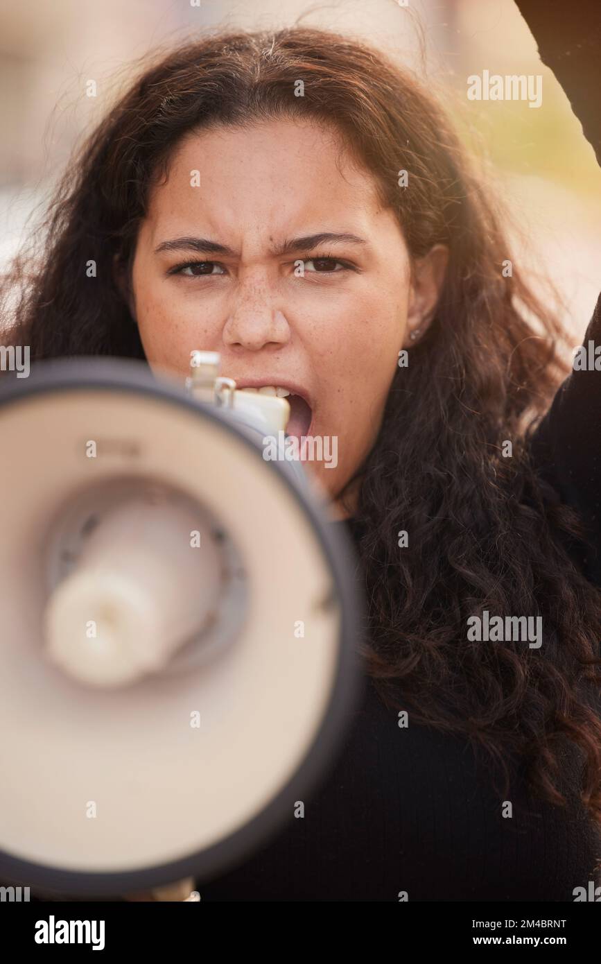 Woman, megaphone and protest in the city for human rights, gender based ...