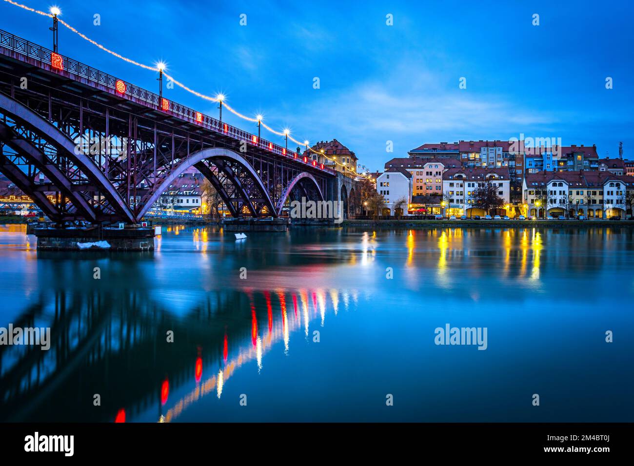 The city of Maribor and Drava River at twilight. Photo taken on 1st of ...