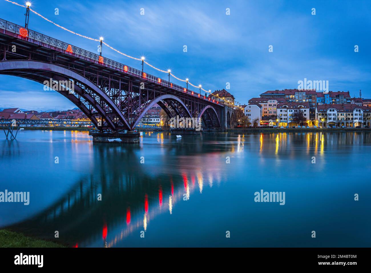 The city of Maribor and Drava River at twilight. Photo taken on 1st of ...