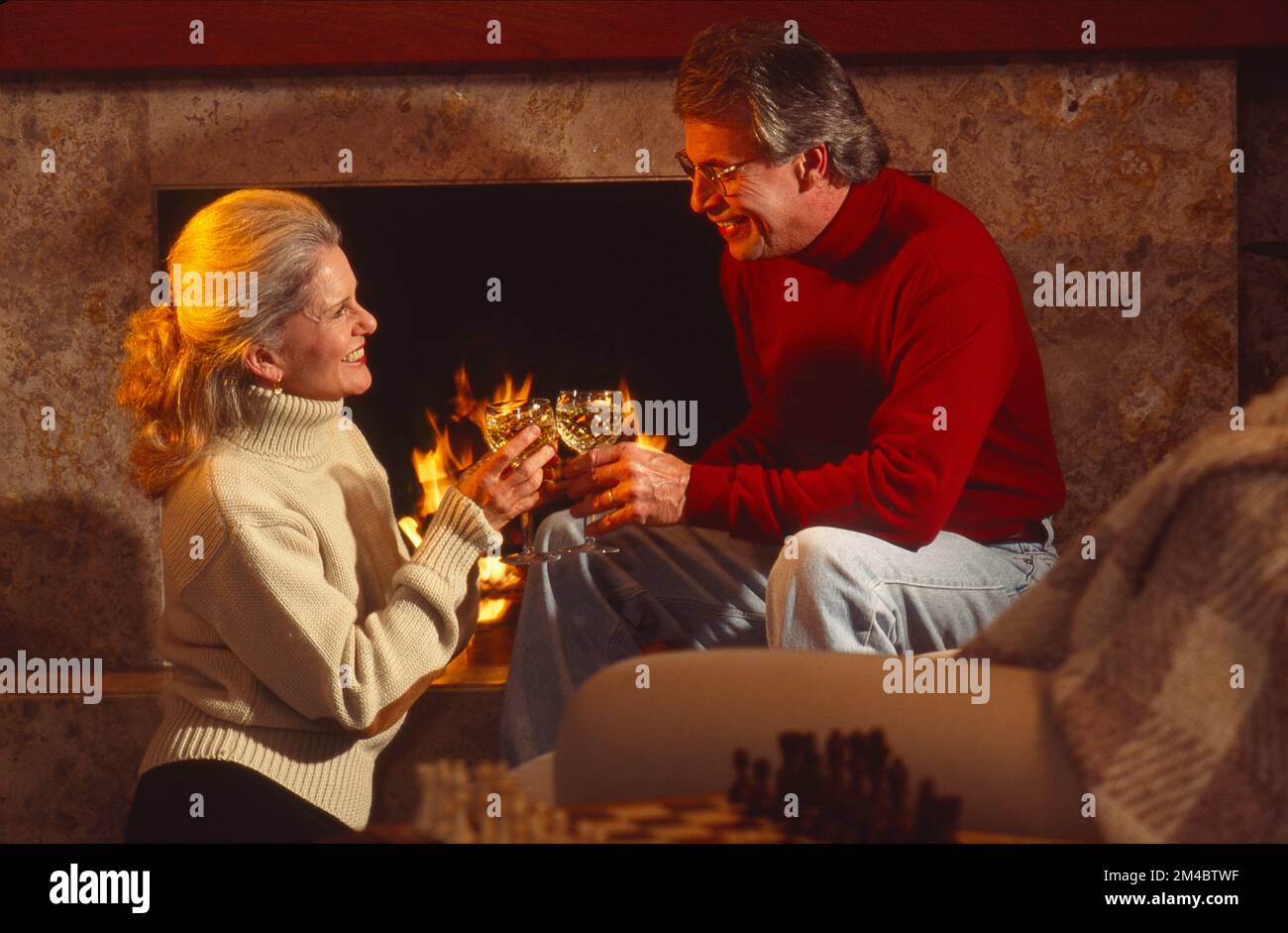 Man sitting fire drink hi-res stock photography and images - Alamy