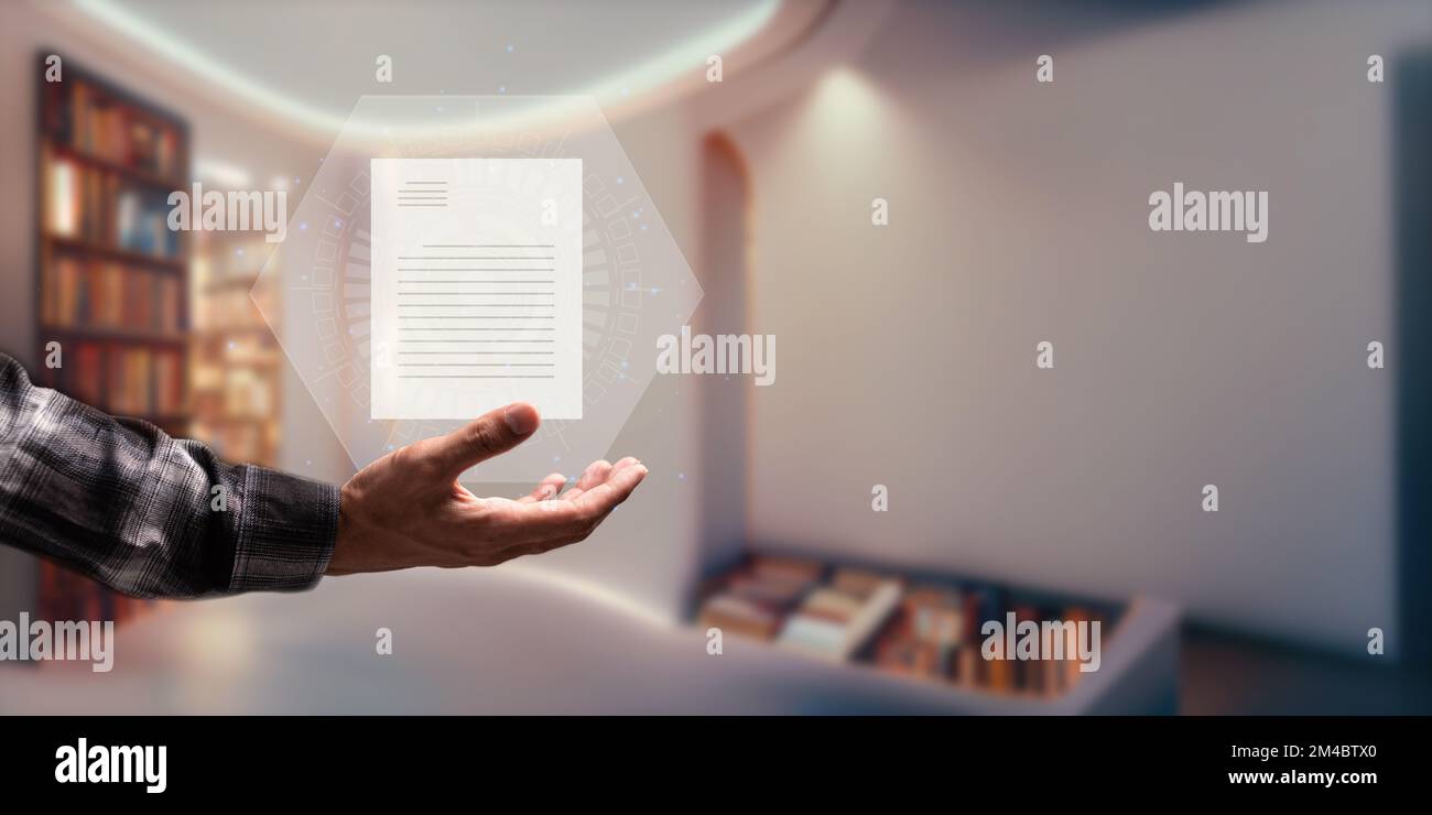 A young man holding a floating digital business document Stock Photo ...