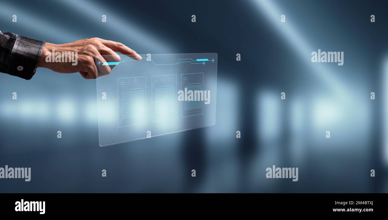 A young man touching a floating digital business document Stock Photo ...