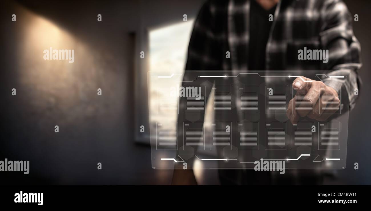 A young man touching a floating digital business document Stock Photo ...