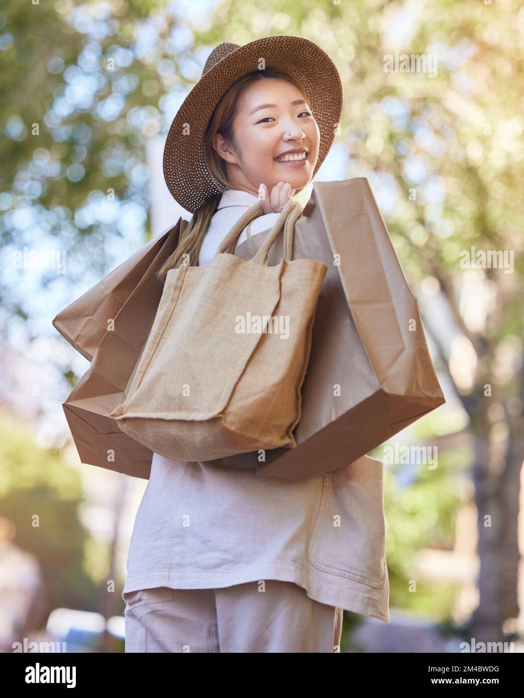 Shopping, street and woman portrait from Japan happy about retail sales ...