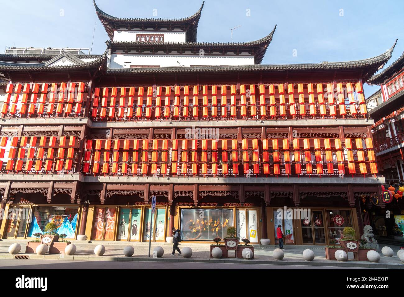 SHANGHAI, CHINA - DECEMBER 20, 2022 - Red lanterns adorn the exterior ...