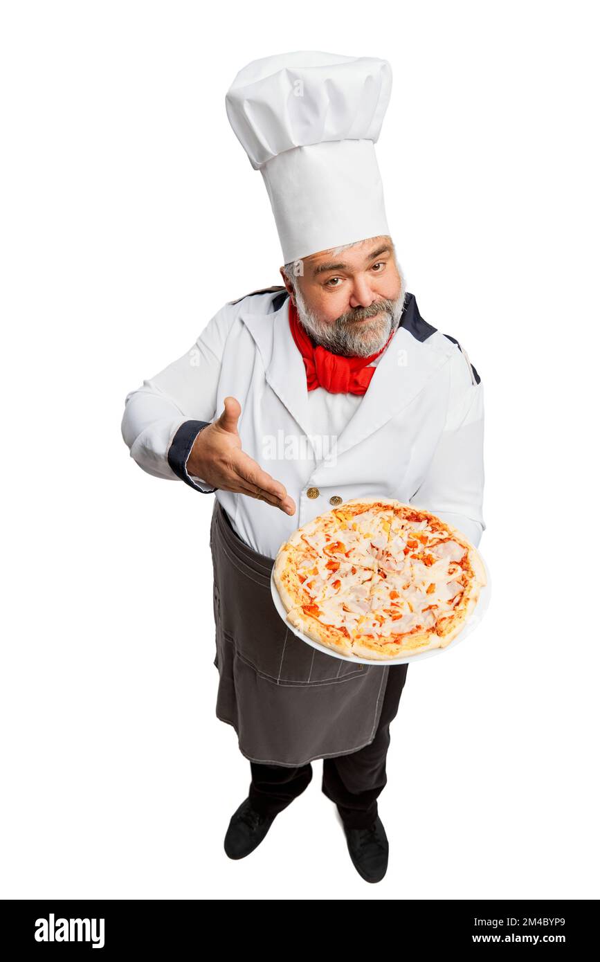 Portrait of bearded man, restaurant chef in uniform serving delicious ...
