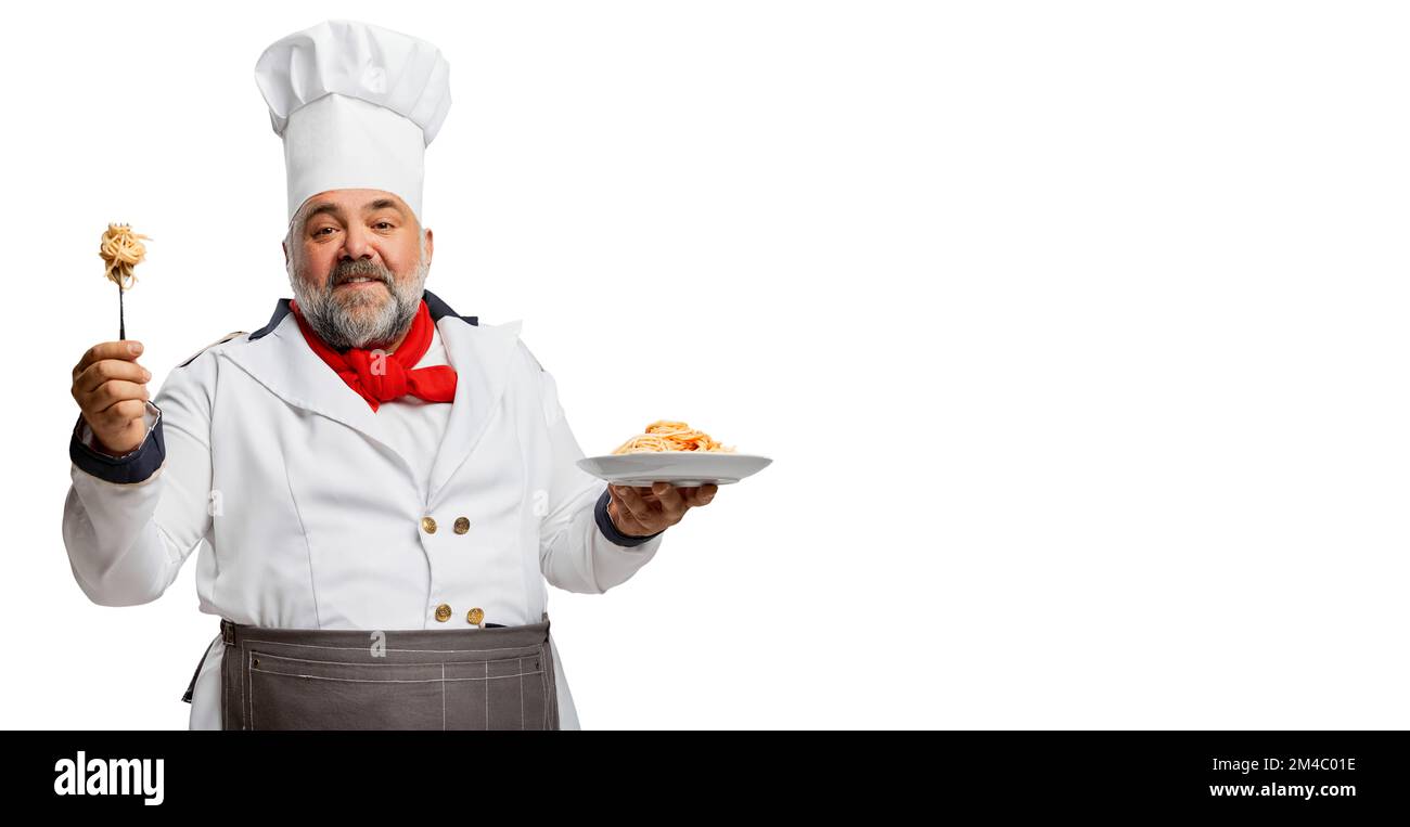Portrait of bearded man, restaurant chef in uniform posing with ...