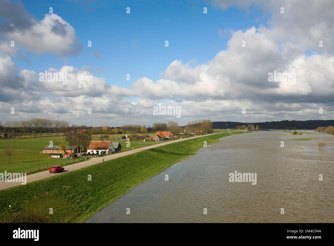 Netherlands, near Arnhem a dike along the river Rhine keeps the water ...
