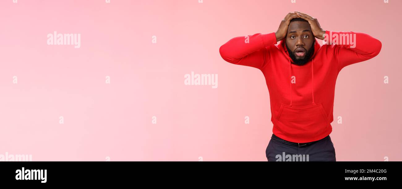 African-american man shocked speechless look upset stupor hold hands ...