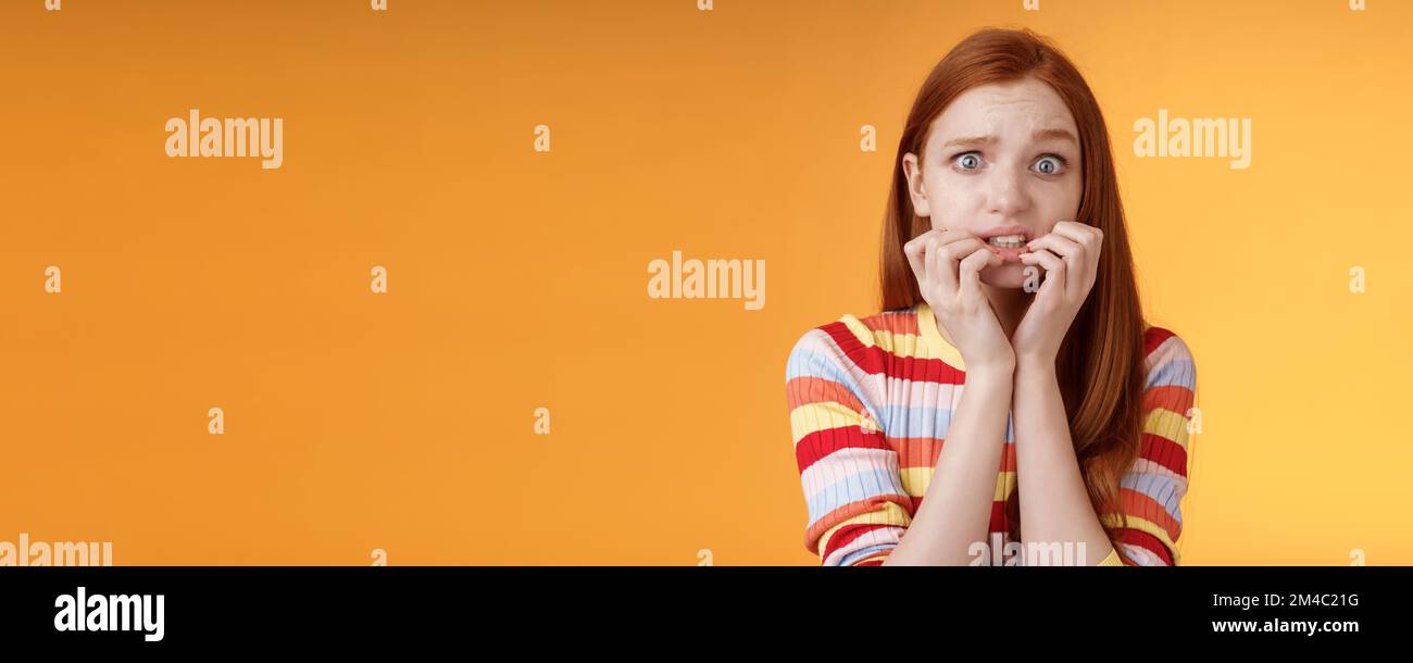 Anxious unconfident timid insecure redhead cute girl worry trembling ...