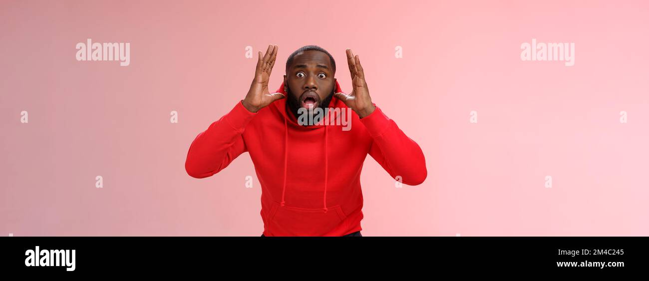 Freaked out panic worried young insecure african american man go crazy ...