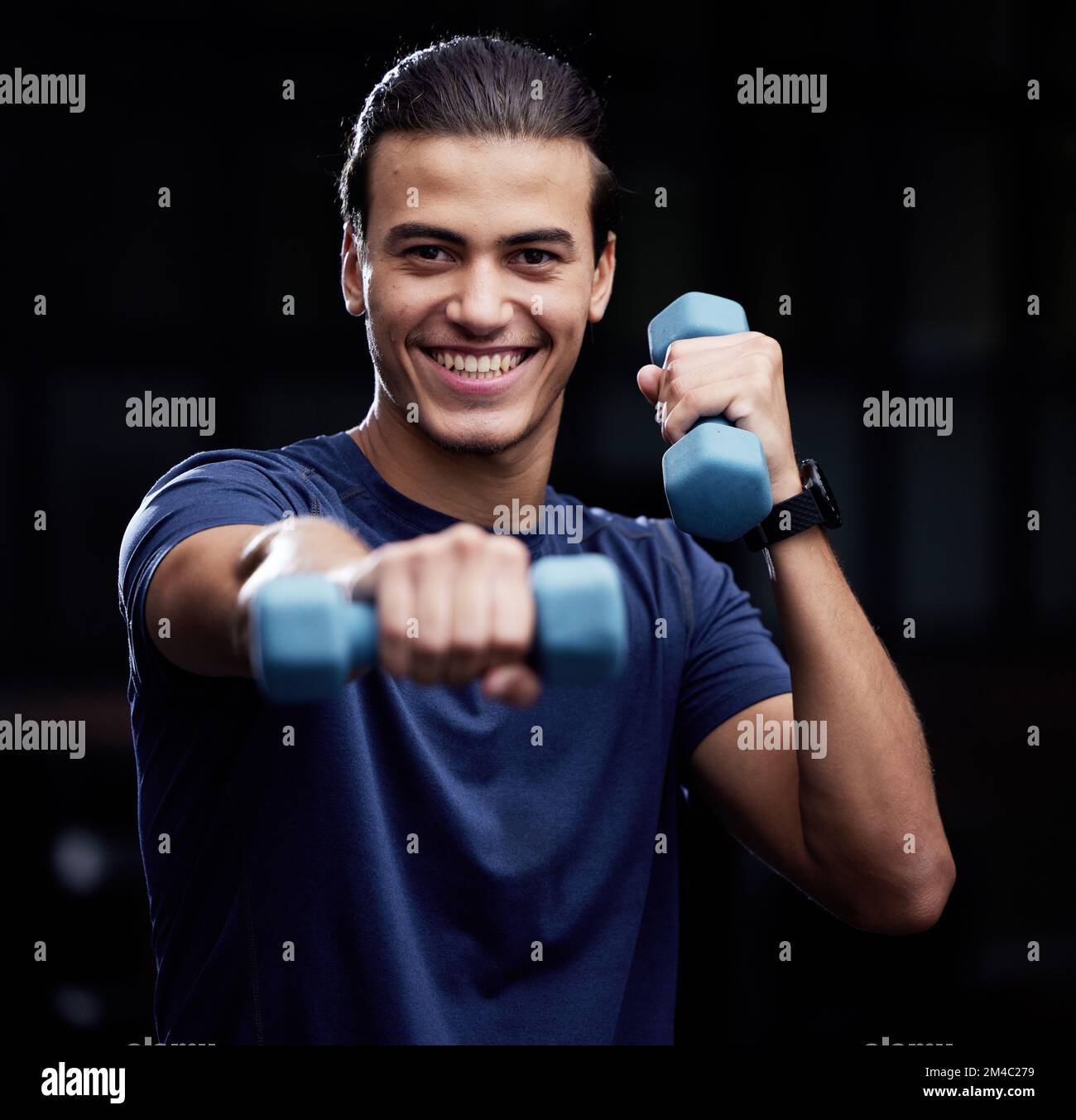 Portrait, fitness or man boxing with dumbbell for strength training, workout or cardio exercise ...