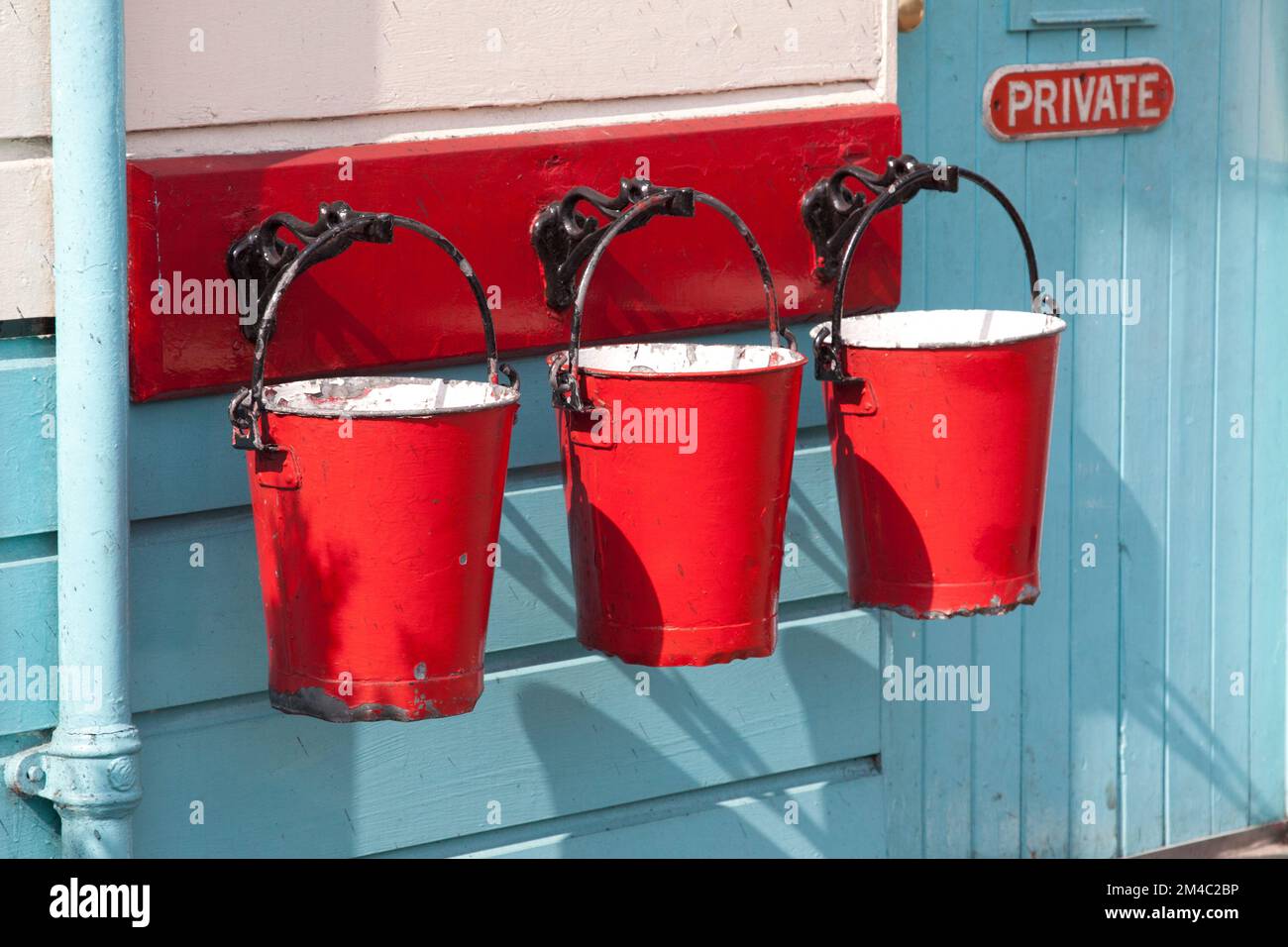 Vintage red fire buckets hi-res stock photography and images - Alamy
