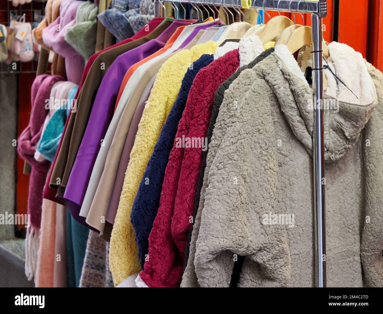 different colors vintage clothes dress for sale Stock Photo - Alamy