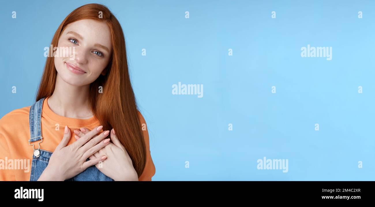 Touched romantic tender cute redhead feminine girl blue eyes tilting ...