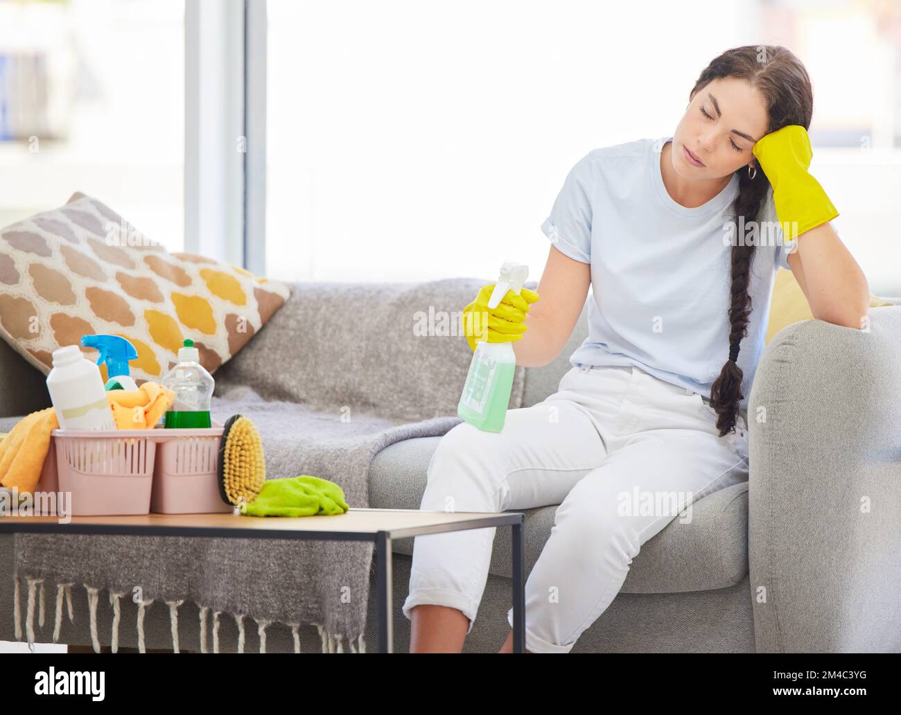 Tired, sad and spring cleaning woman in living room with burnout ...