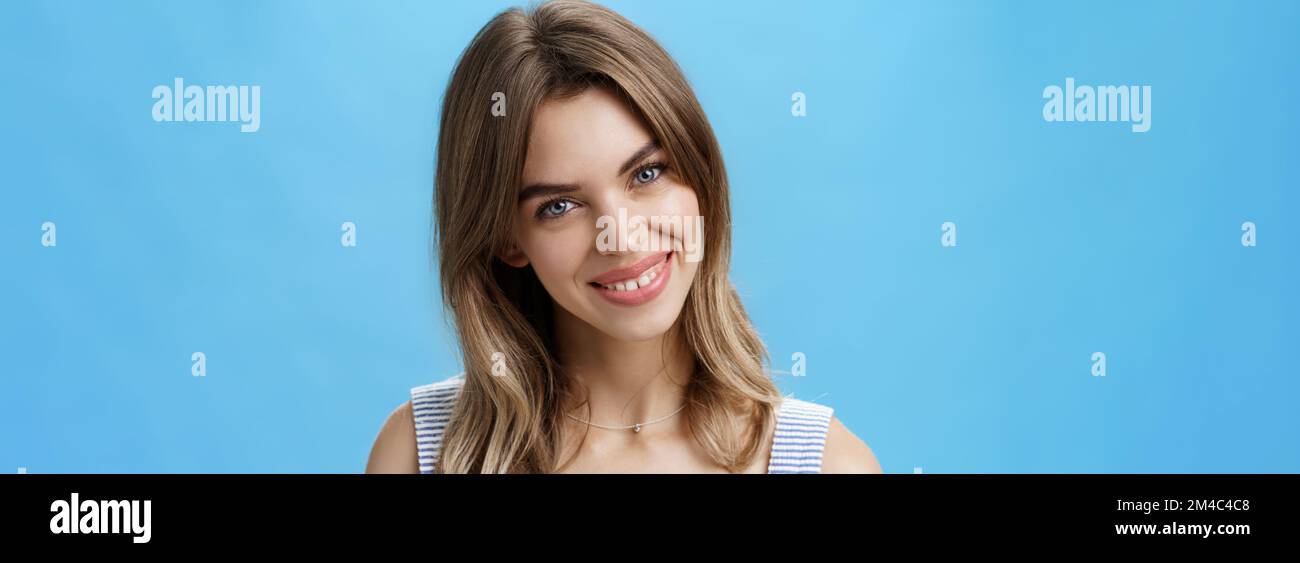 Waist-up shot of charming self-assured authentic woman feeling great ...