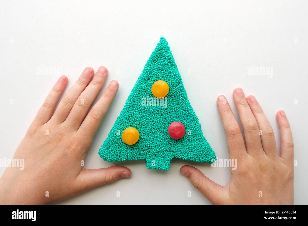 Hands Playing with textured slime with bubbles, stretching the gooey ...