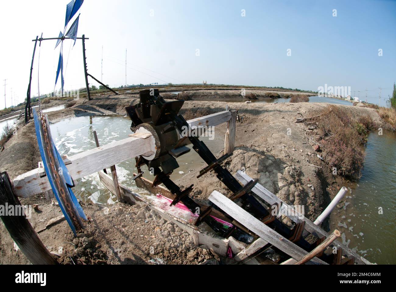 Ancient and new wind mill use for move the sea water into the salt ...