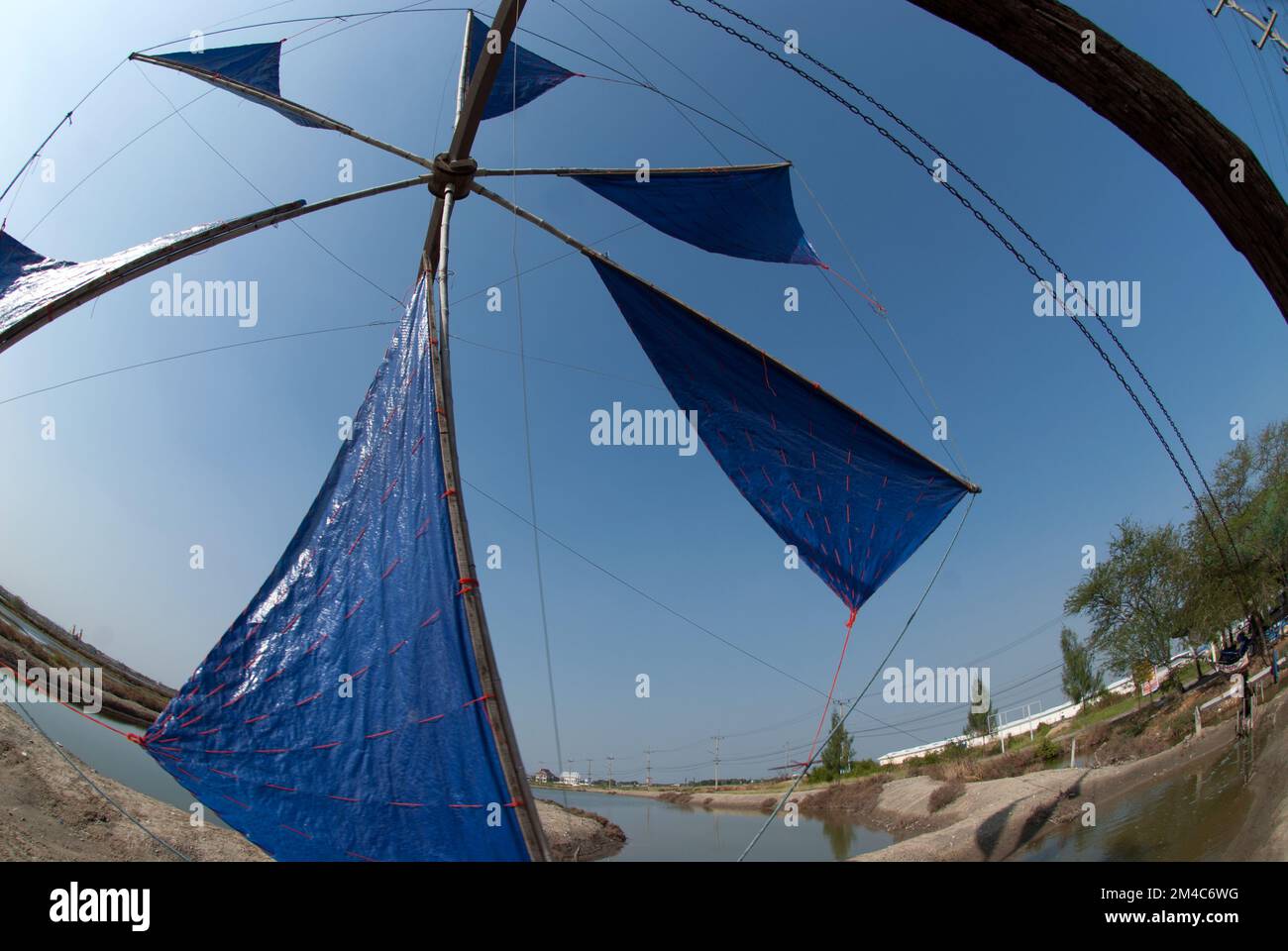 Ancient and new wind mill use for move the sea water into the salt ...