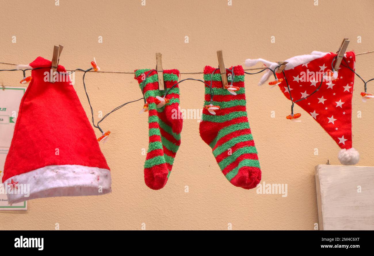 Christmas stockings and Santa hats. Christmas decorations Stock Photo ...