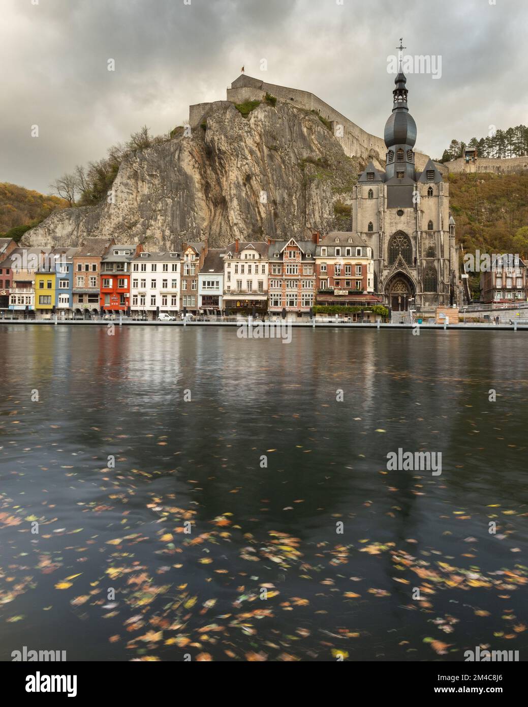 The Dinant Citadel on the other side of river in Dinant, Belgium with ...