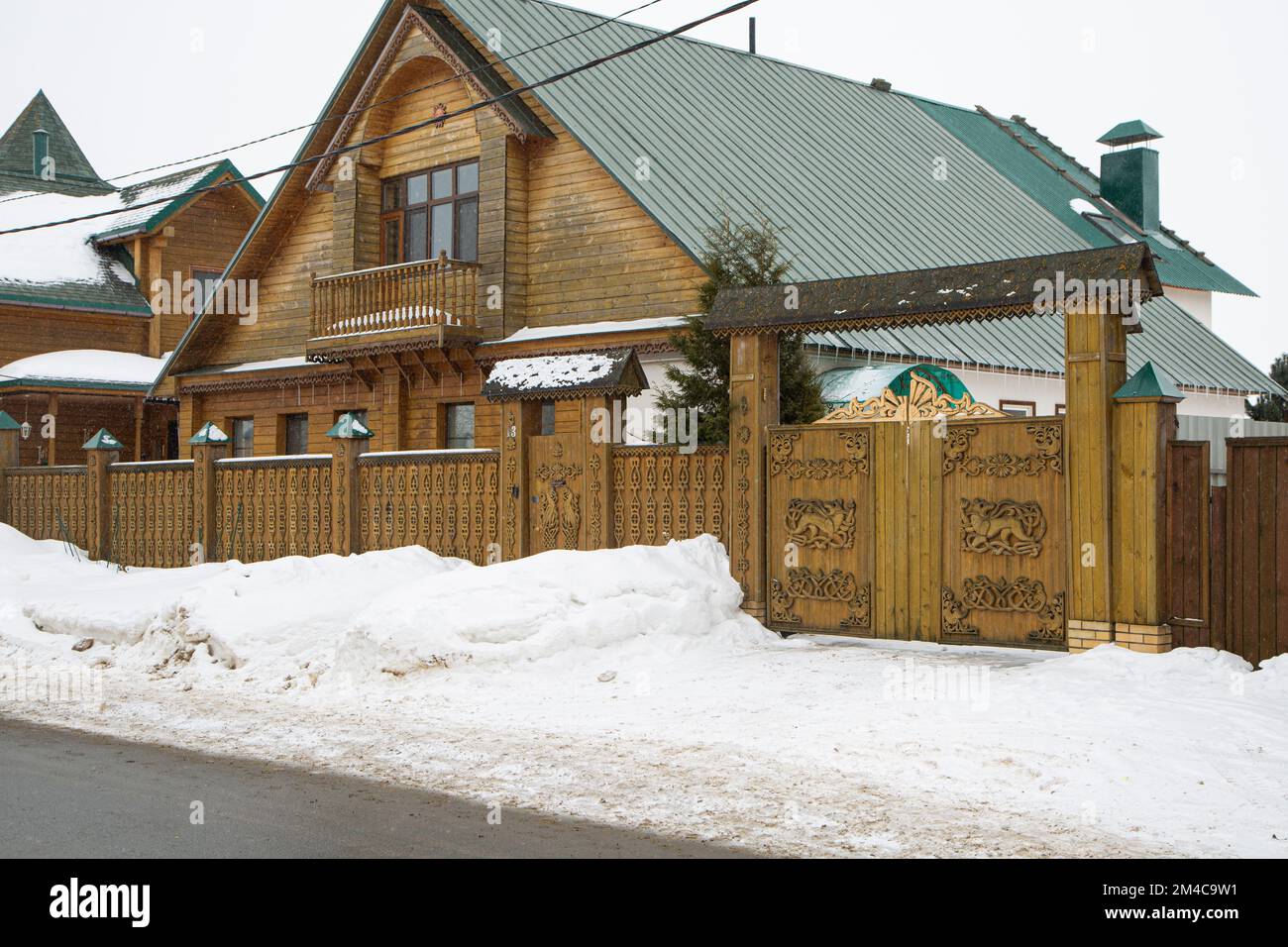 A Russian wood house covered in snow Stock Photo - Alamy