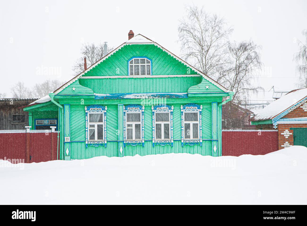 A Russian wood house covered in snow Stock Photo - Alamy