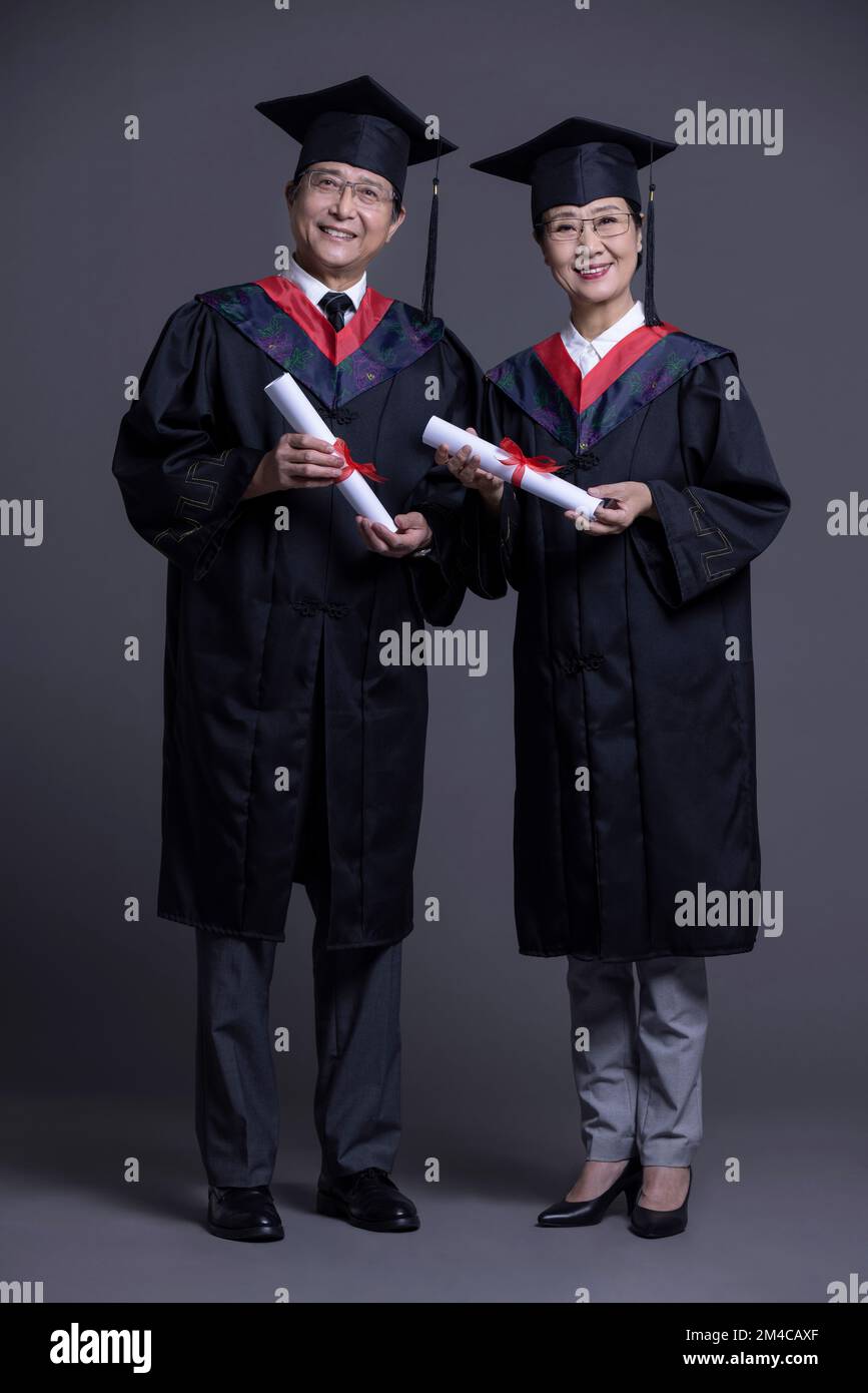 Senior Chinese students cheering for graduation Stock Photo - Alamy