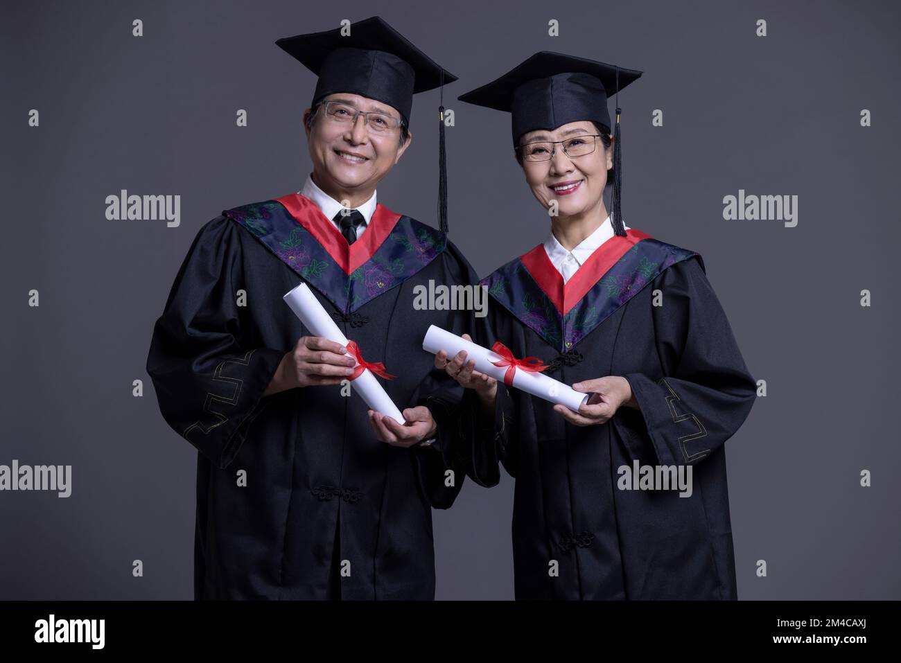 Senior Chinese students cheering for graduation Stock Photo - Alamy