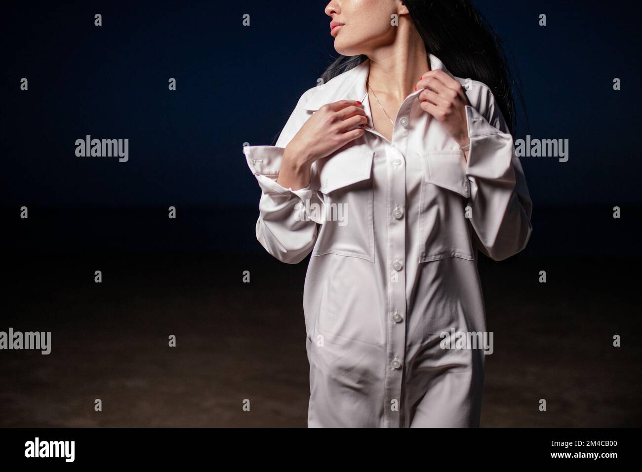 a girl in a white blouse without a face Stock Photo - Alamy
