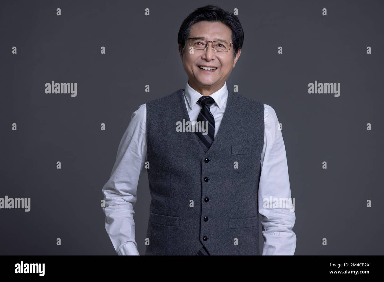 Portrait of confident Chinese businessman Stock Photo - Alamy