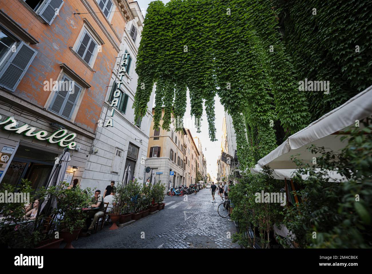 Rome, Italy - July 27, 2022: Via Panisperna street with trattoria in ...