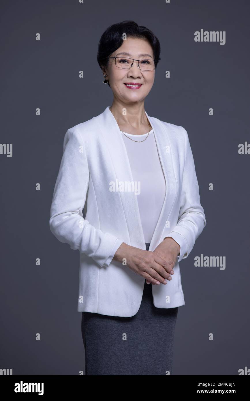 Asian senior woman skirt hi-res stock photography and images - Alamy